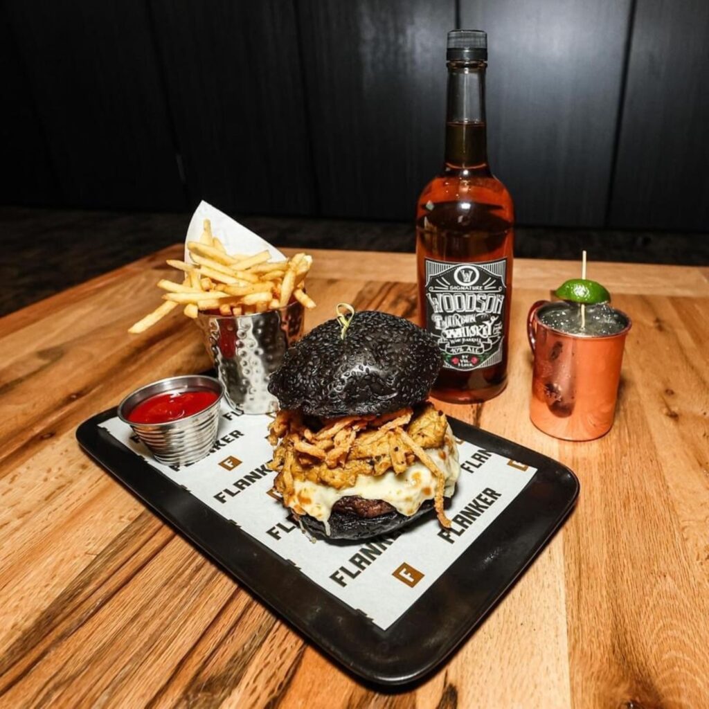 Las Vegas Raiders Josh Jacobs Eats the 'Black Hole Burger' at Flanker ...