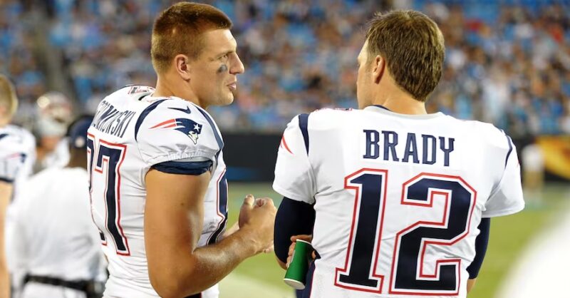 Tom Brady and Rob Gronkowski Hilariously Damage Lombardi Trophy During Wild Fanatics Fest 2025 ...