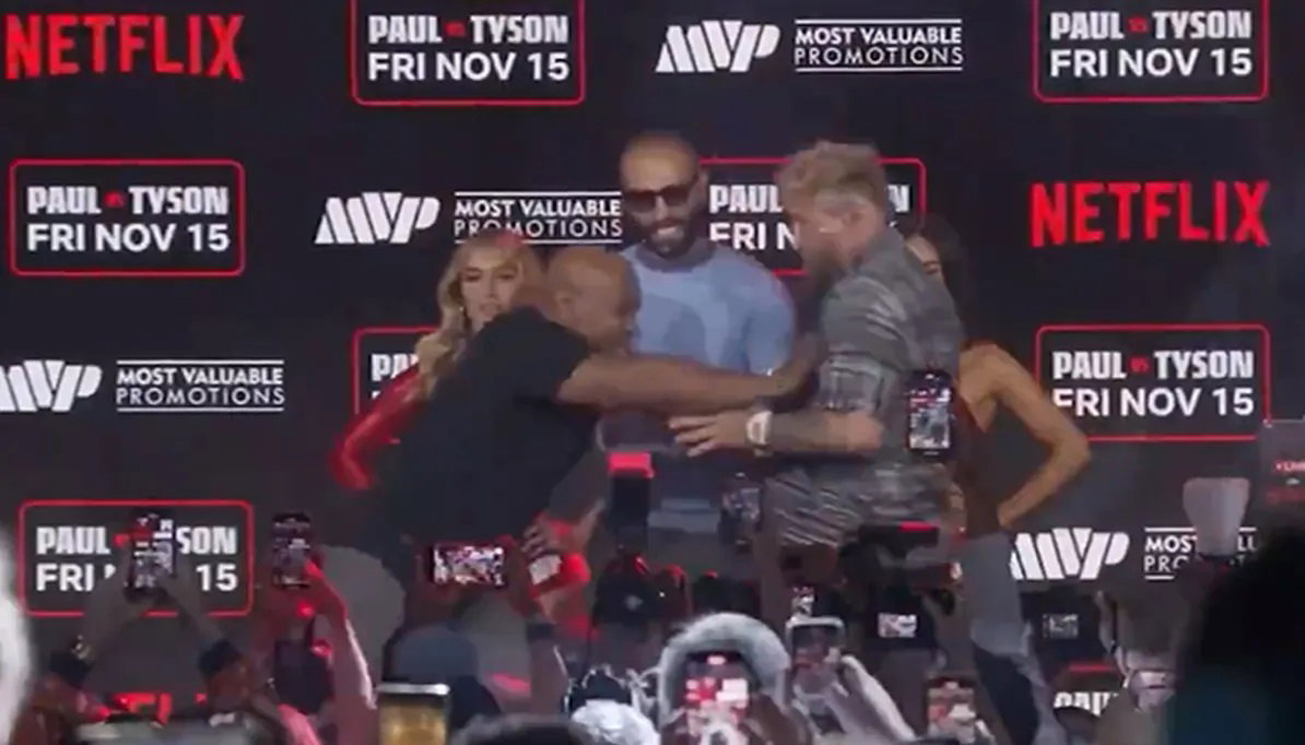 Mike Tyson and Jake Paul Throw Hands During Fight Promotion at Fanatics ...