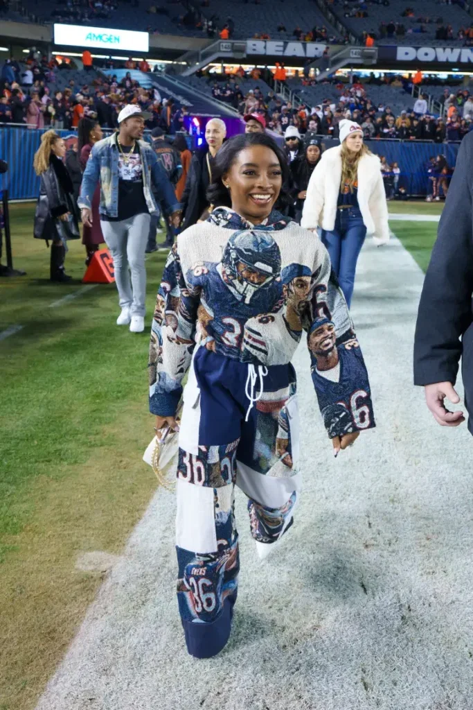 Simone Biles Stuns at Bears Game in Custom Ensemble Featuring Photos of ...