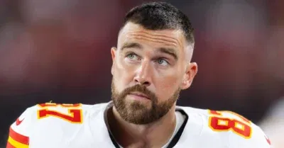 Travis Kelce Turns Heads in Outlandish Suit as He Joins Chiefs in ...
