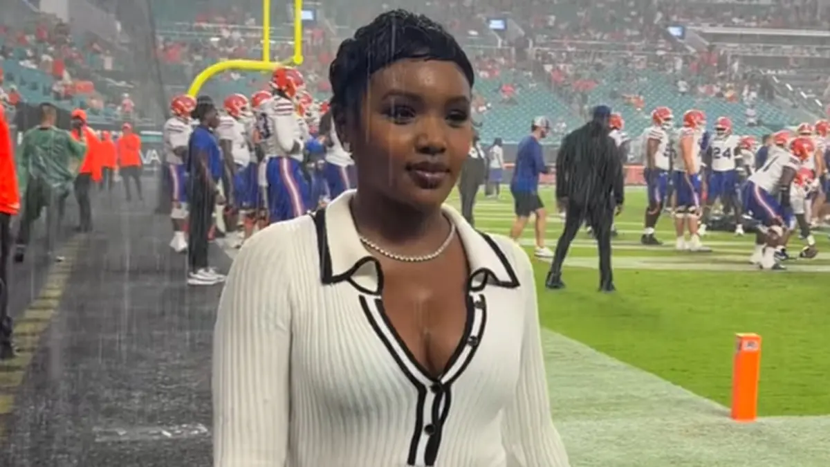 Reporter Janerika Owens Turns Heads in Sleek White Outfit Amid Rain at ...