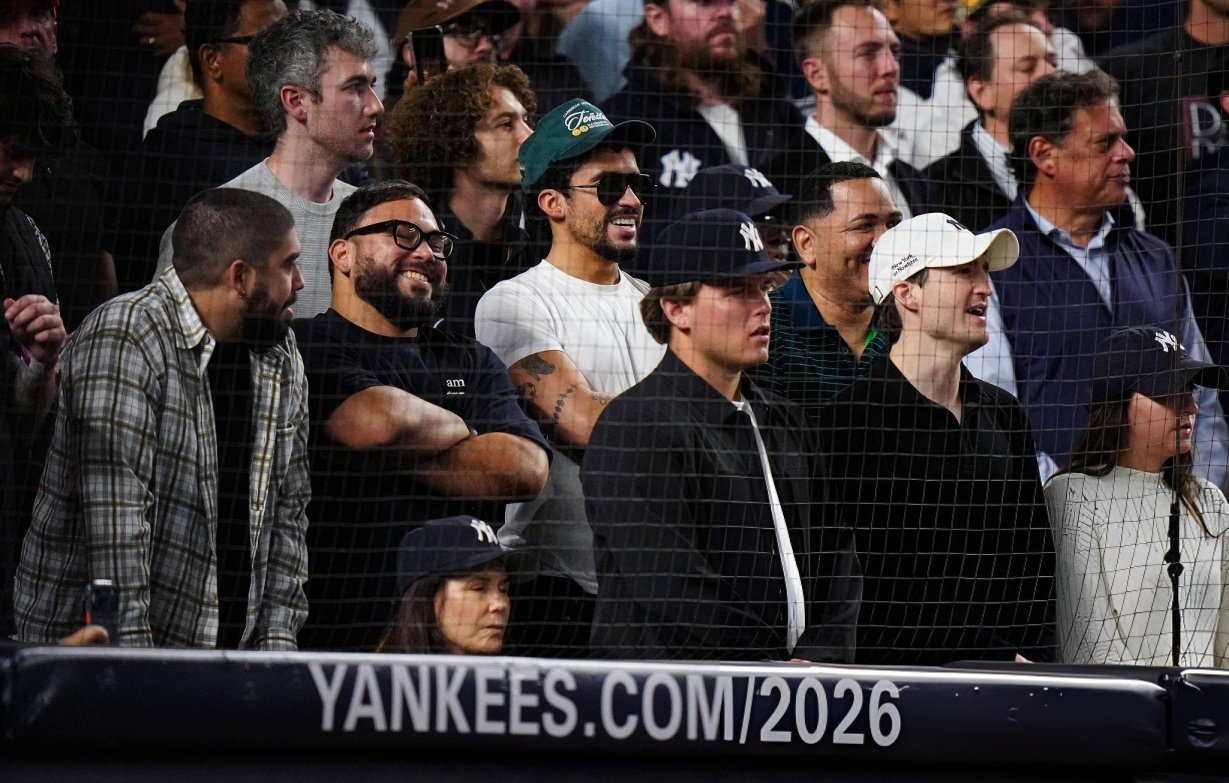 Bad Bunny Faces Backlash After Remaining Seated During ‘God Bless ...